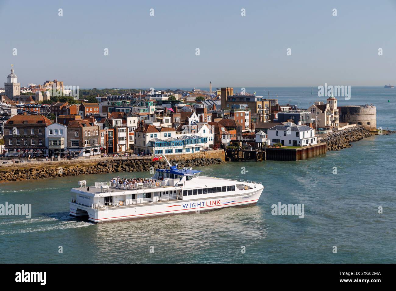 Wightlink catamaran leaving Portsmouth harbour with the Round Tower on ...
