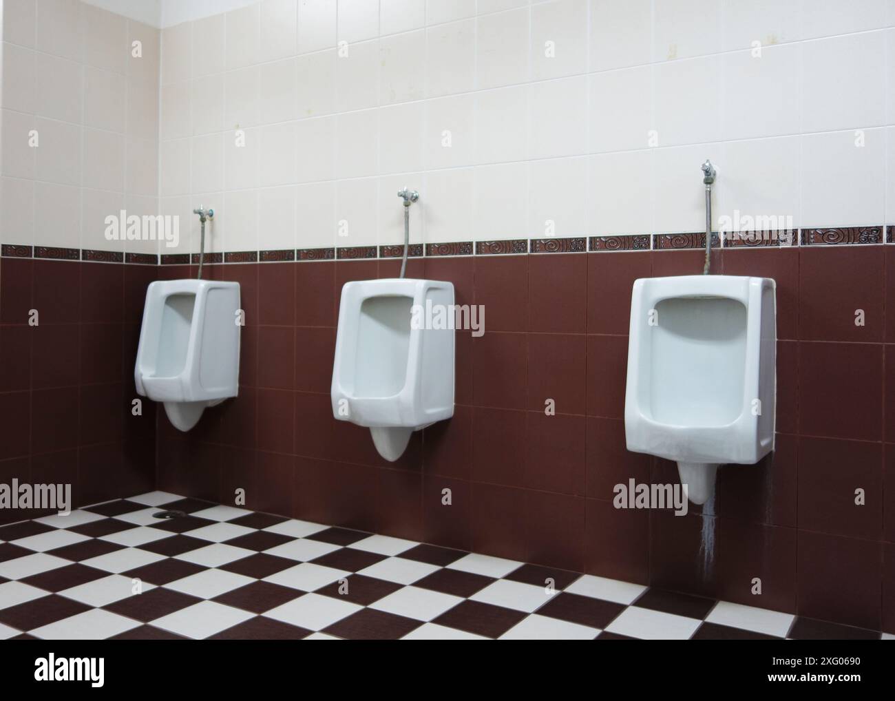 Urinals in public washroom hi-res stock photography and images - Alamy