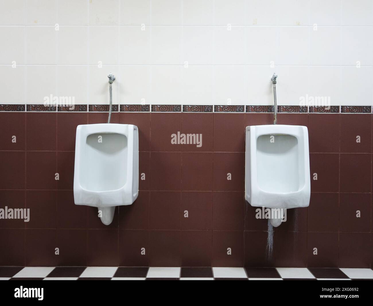 Urinals in public washroom hi-res stock photography and images - Alamy
