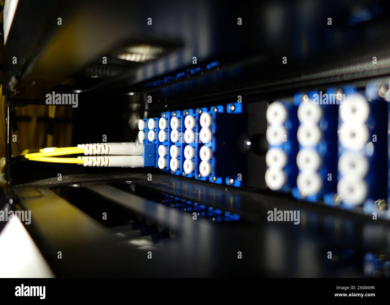 fiber optic with servers in a technology data center Stock Photo - Alamy