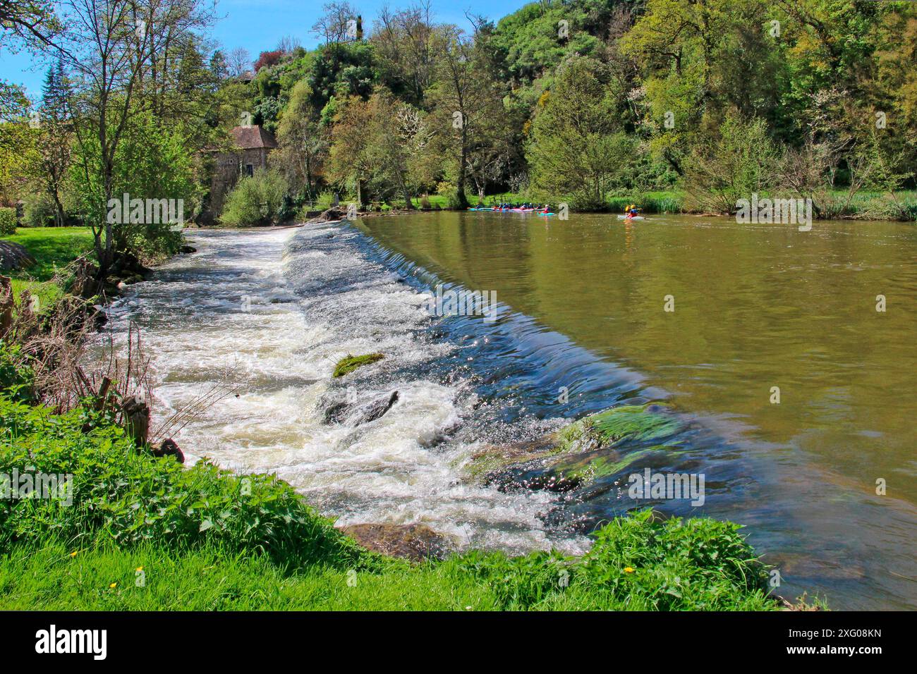 River Sarthe and its small waterfalls, Saint-Ceneri-le-Gerei, village ...
