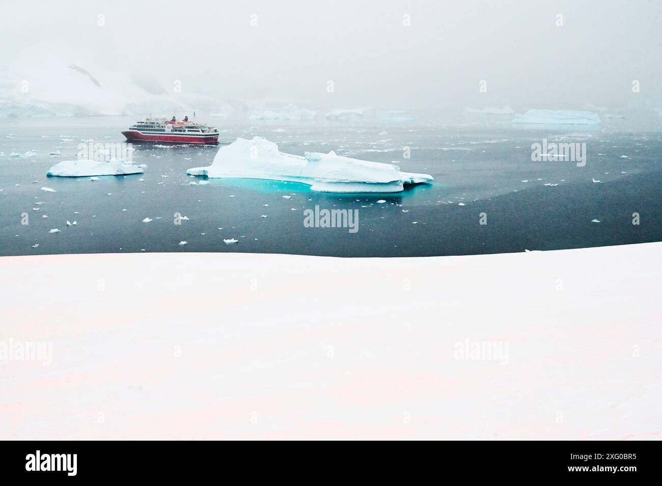 The cruise ship in antarctic sea. Cruise on board Exploris One ...