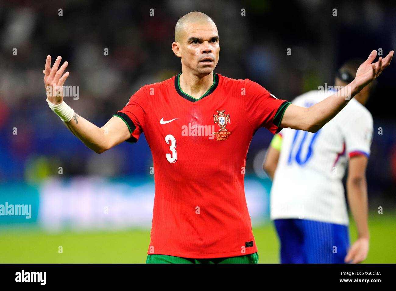 Portugal's Pepe attempts to encourage the fans during the UEFA Euro ...