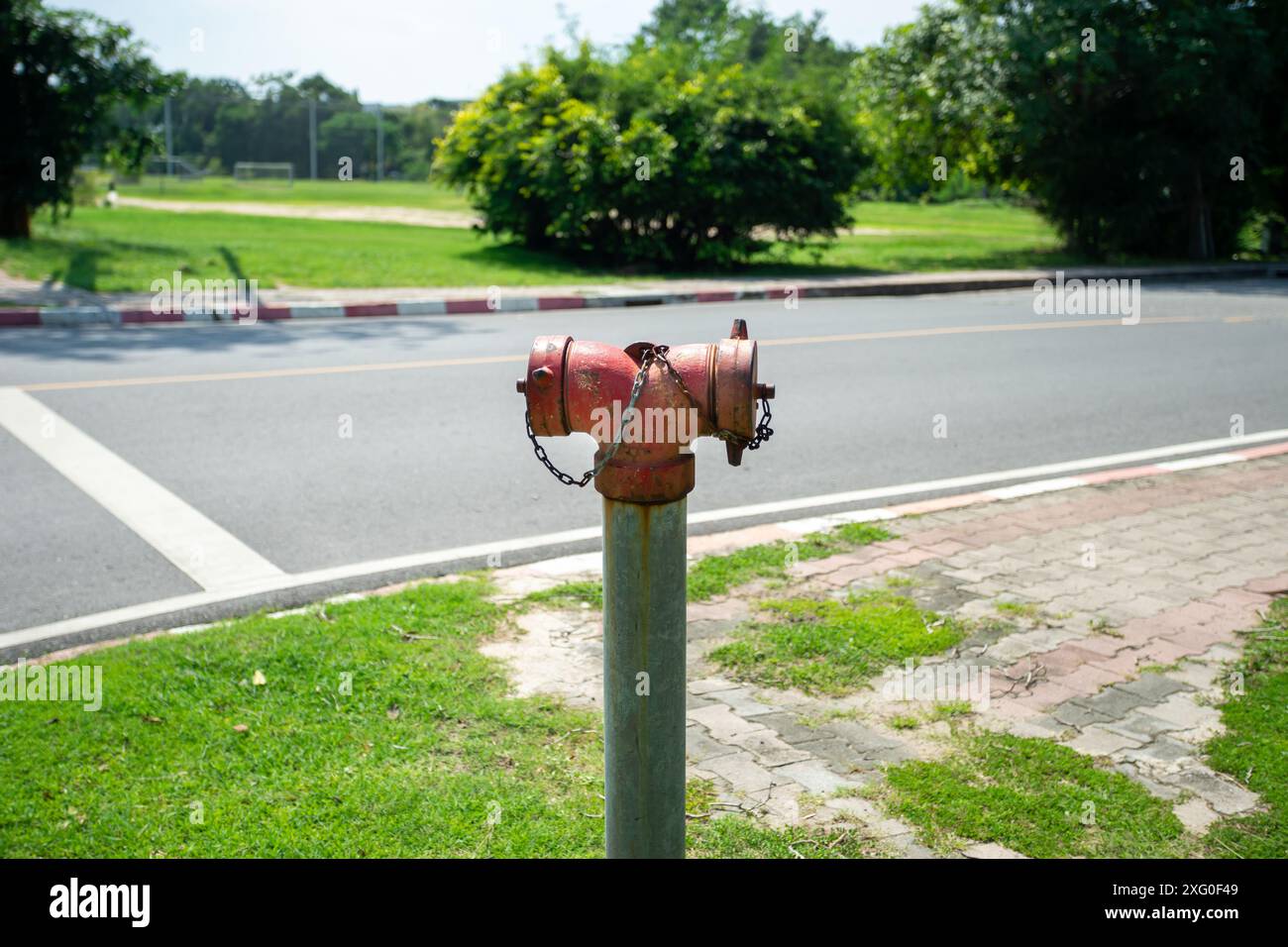 fire extinguishing pole in public place Stock Photo - Alamy
