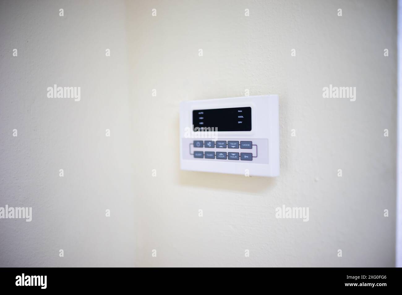 Close-up of air condition keypad on the wall Stock Photo - Alamy