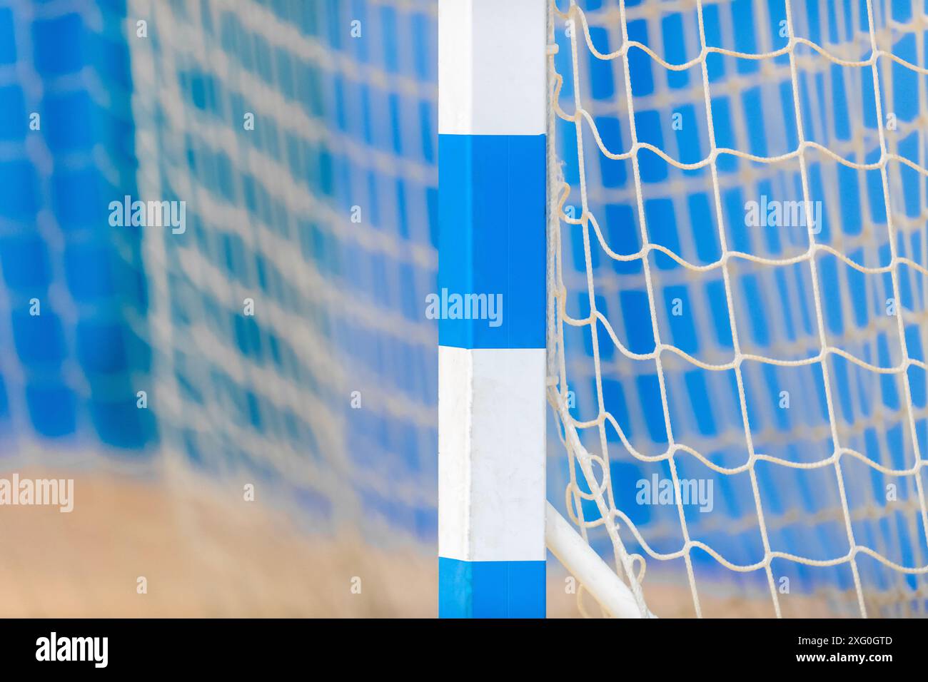 Gate for futsal or handball in gym. Detail of gate frame and net ...