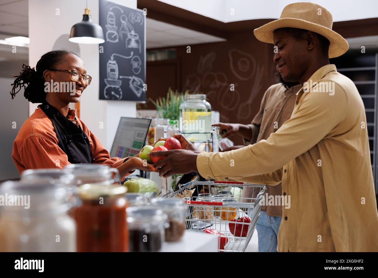 African American shopkeeper of an eco friendly business with fresh ...