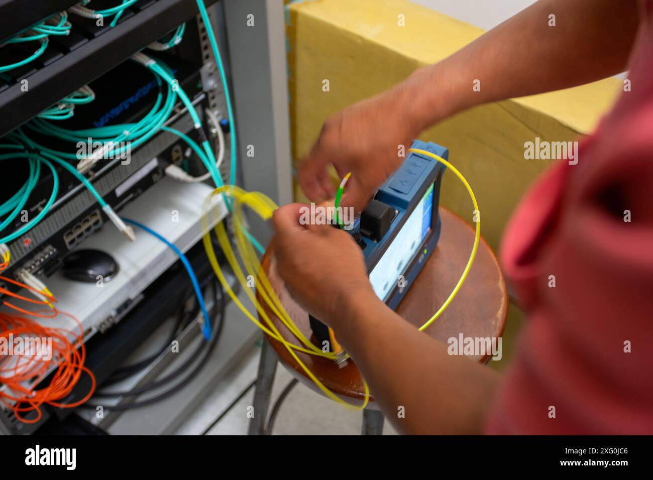 Testing signal Fiber optic cables for readiness for use Stock Photo - Alamy
