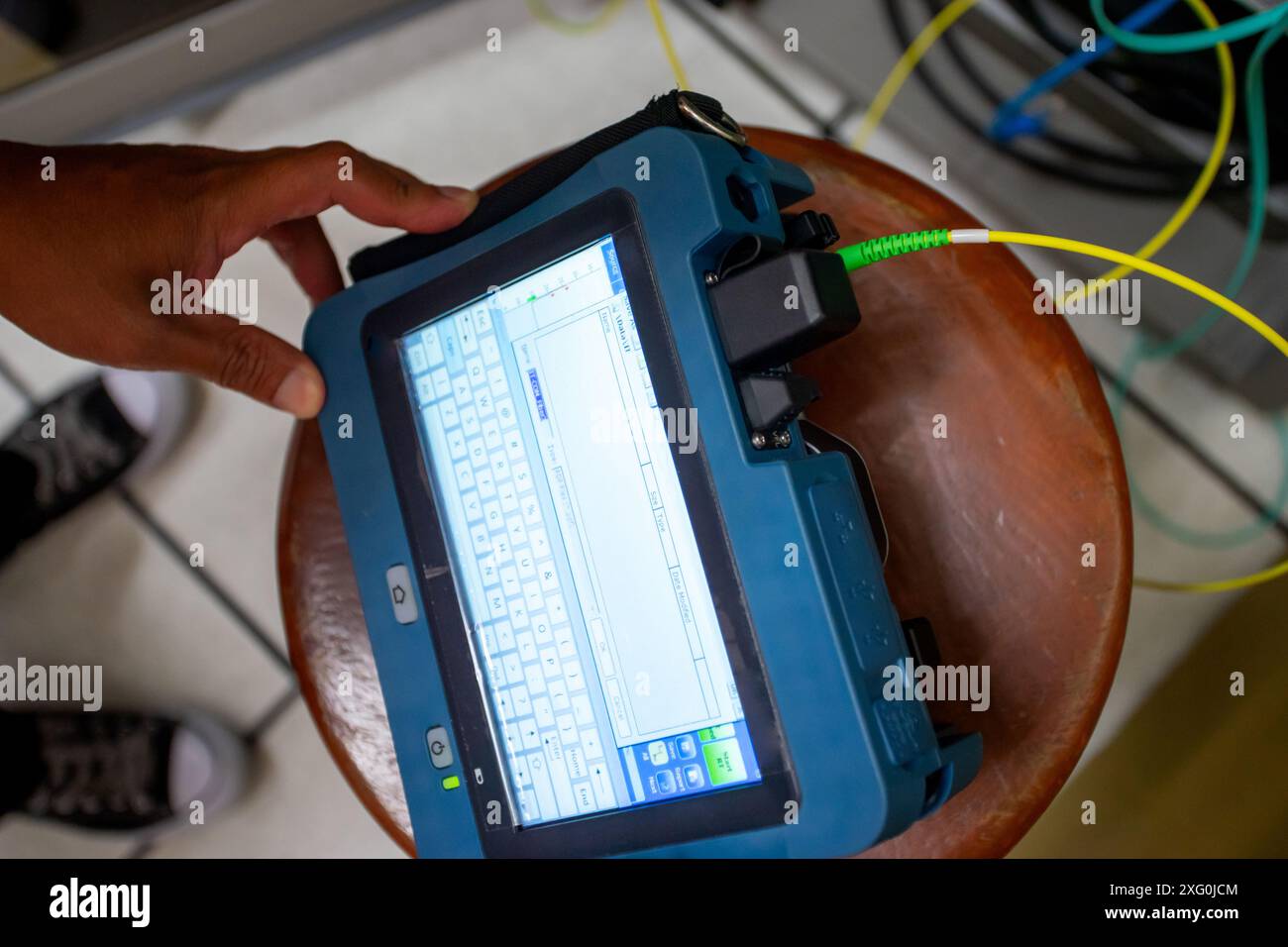 Testing signal Fiber optic cables for readiness for use Stock Photo - Alamy