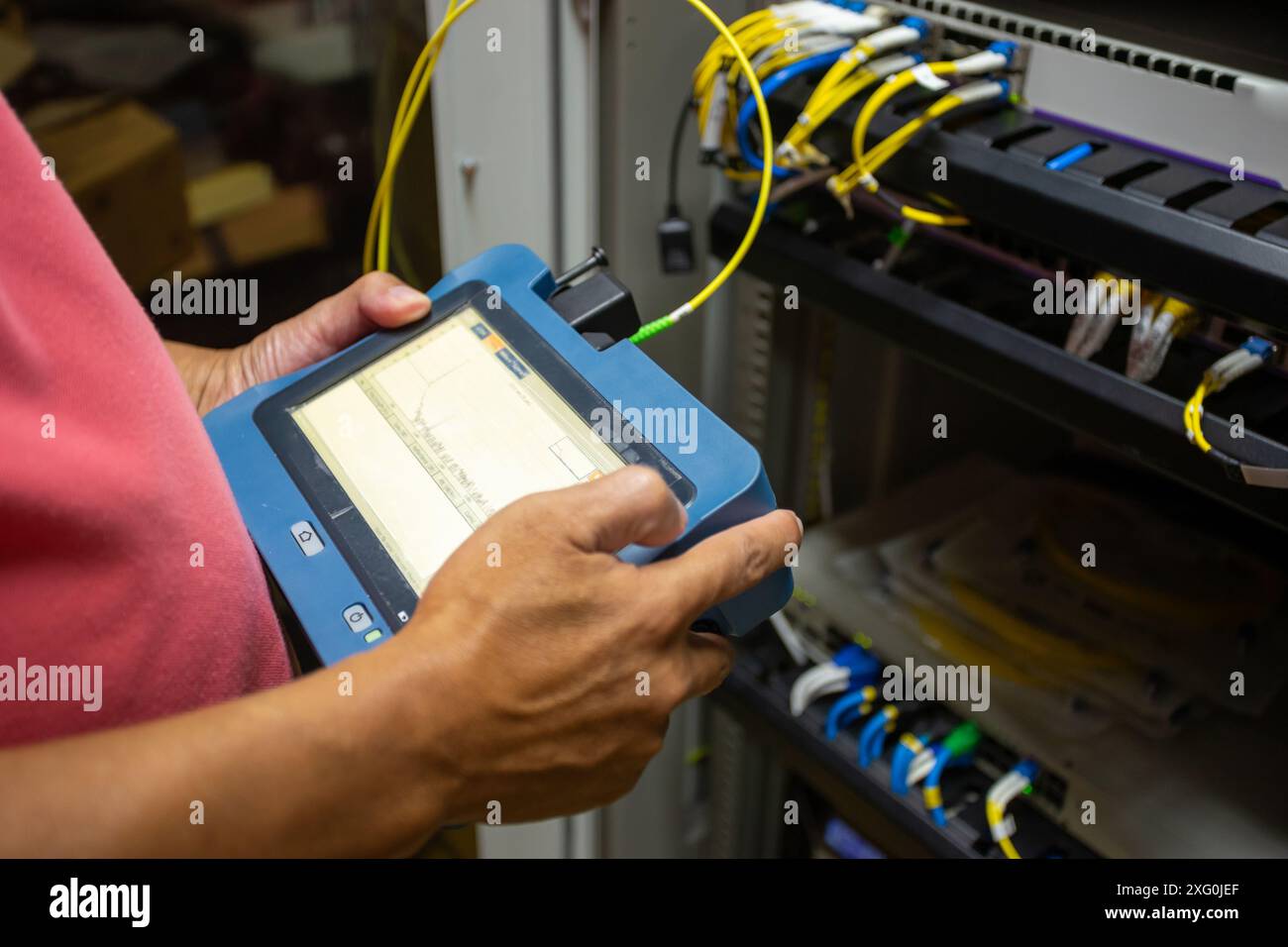 Testing signal Fiber optic cables for readiness for use Stock Photo - Alamy