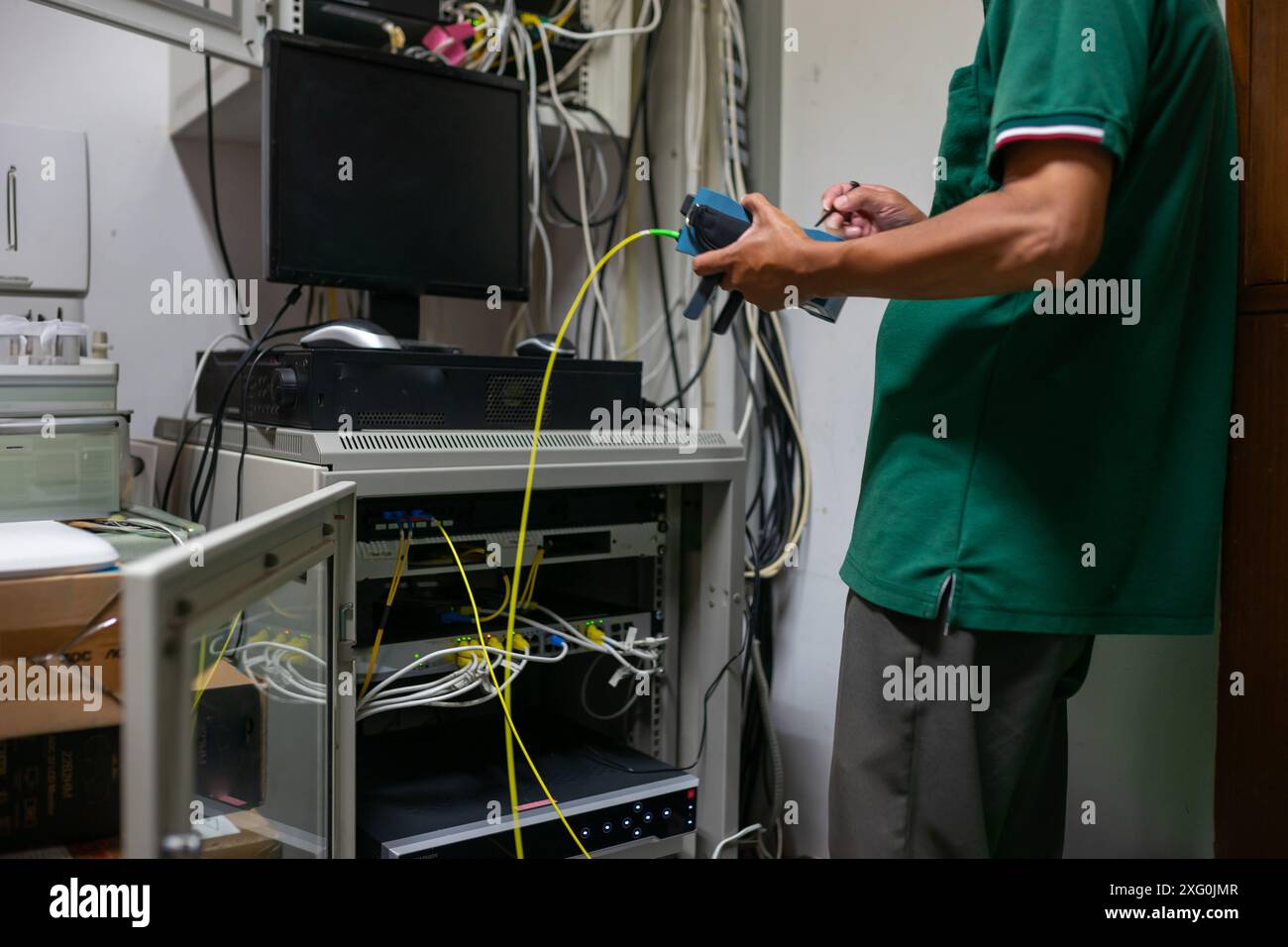 Testing signal Fiber optic cables for readiness for use Stock Photo - Alamy