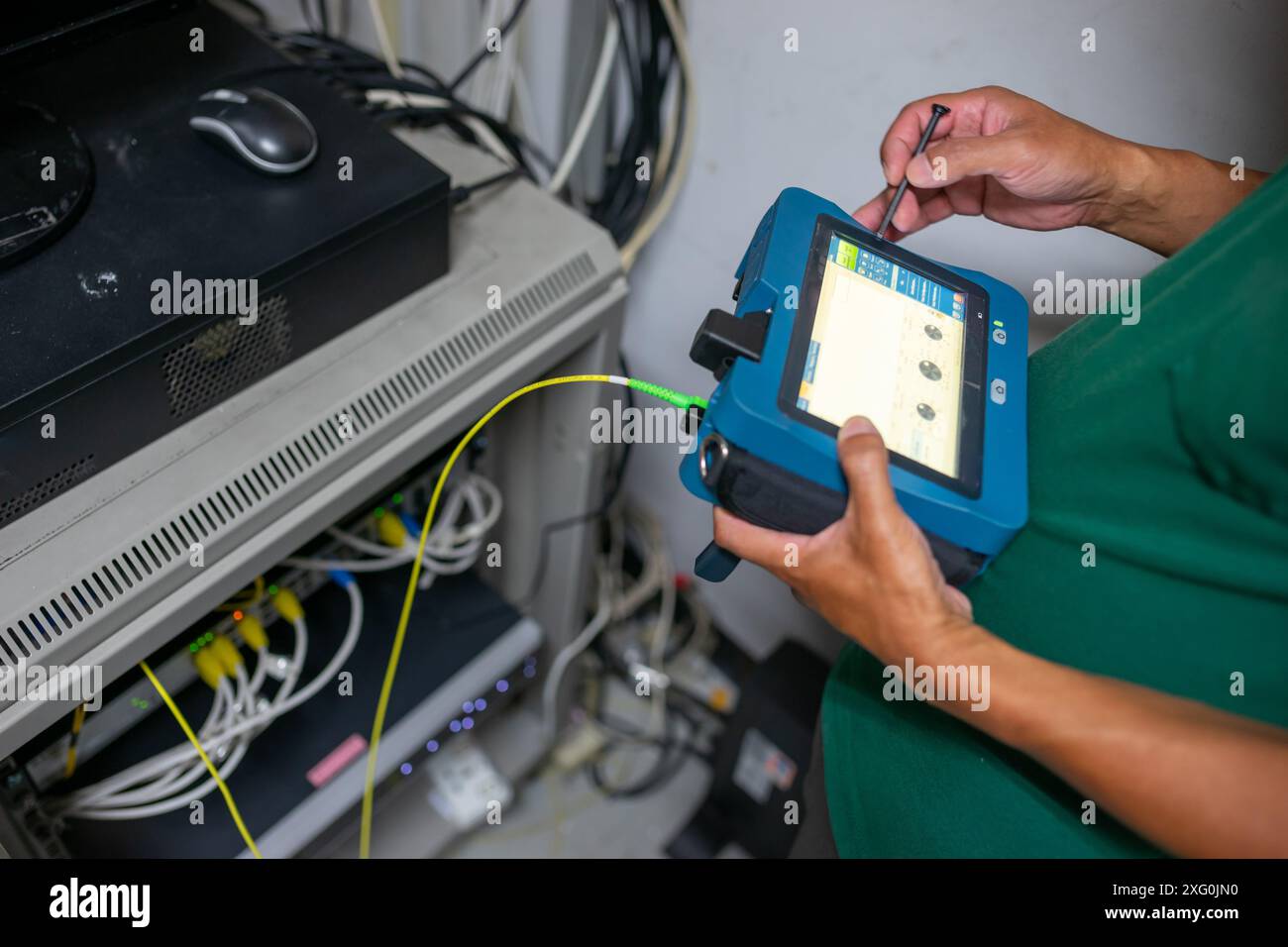 Testing signal Fiber optic cables for readiness for use Stock Photo - Alamy