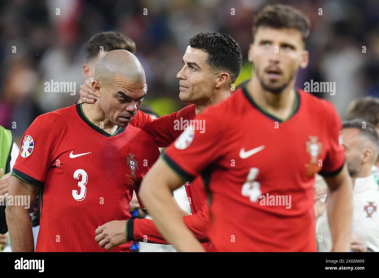 Portugal's Cristiano Ronaldo consoles team-mate Pepe (left) after ...