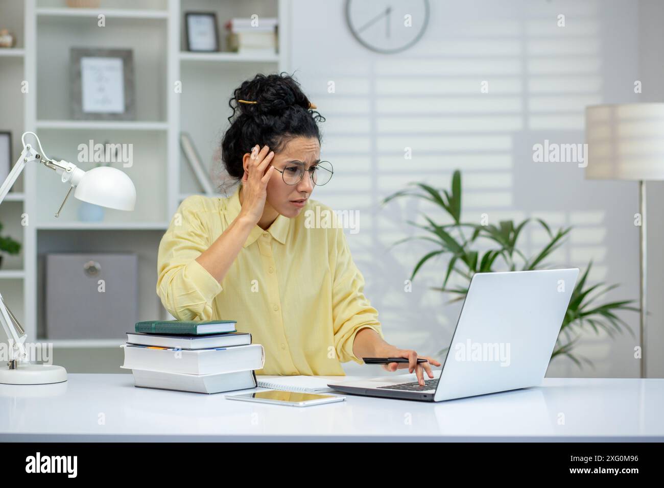 Woman looks stressed overwhelmed working hi-res stock photography and ...