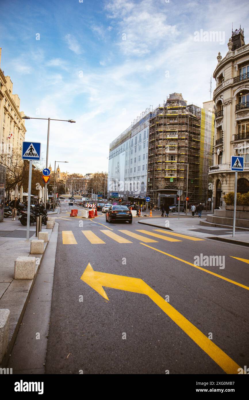 Madrid, Spain. July 1, 2024 Asphalt road with yellow markings for ...