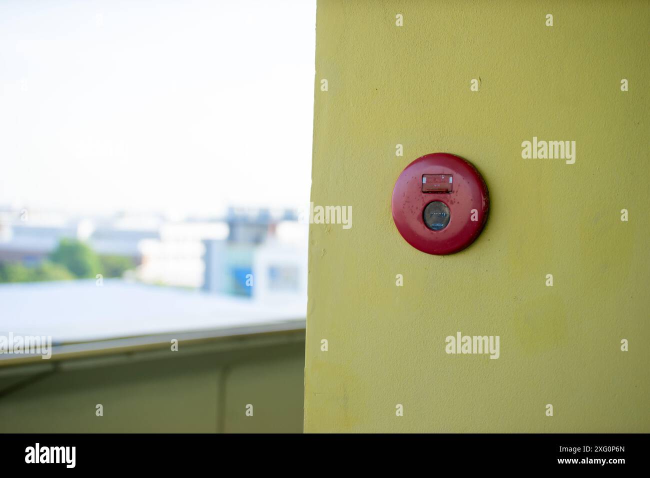 Fire bell pull sign in supermarket Stock Photo - Alamy