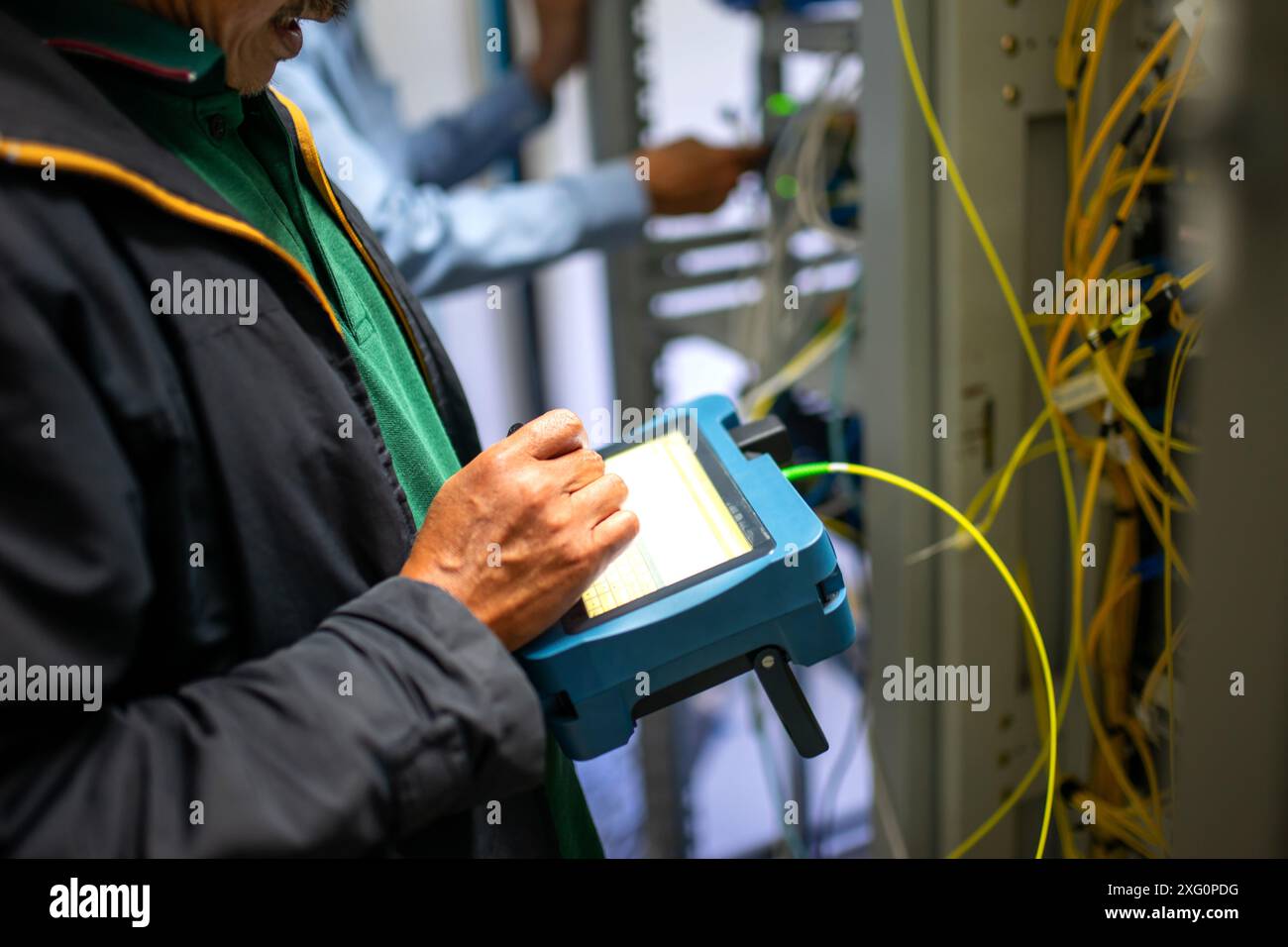 Testing signal Fiber optic cables for readiness for use Stock Photo - Alamy