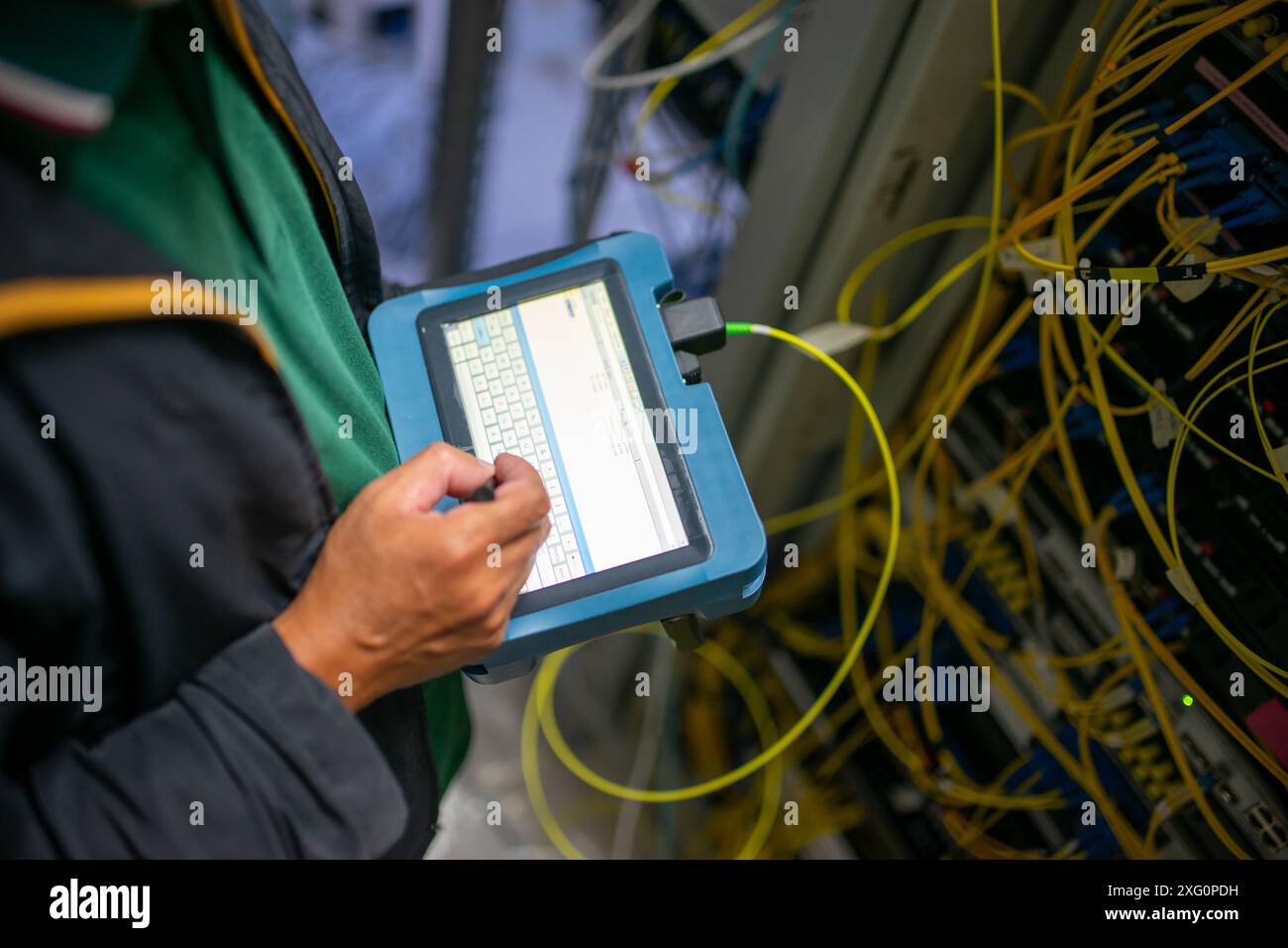 Testing signal Fiber optic cables for readiness for use Stock Photo - Alamy