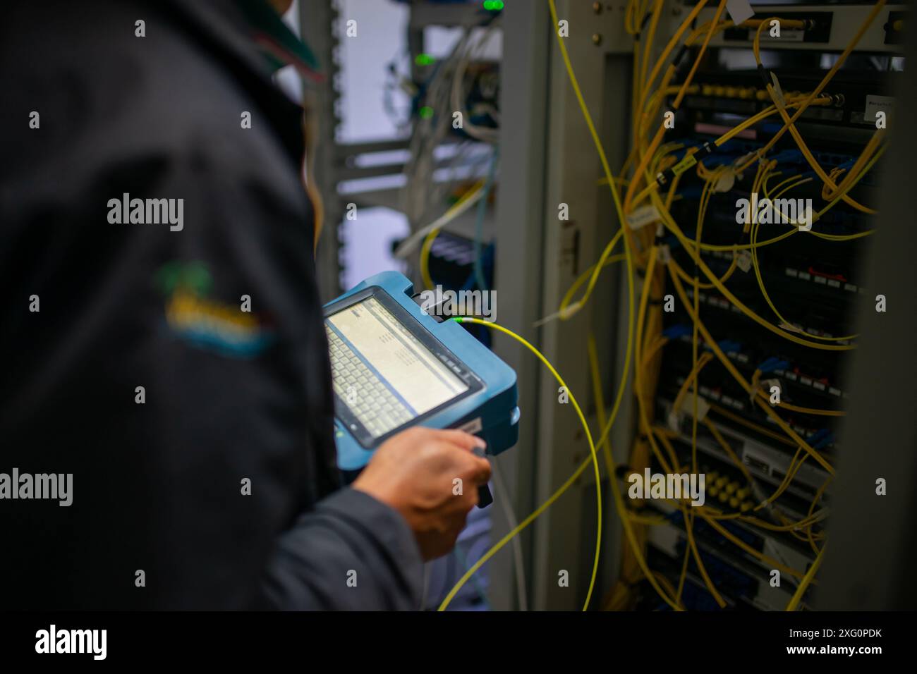 Testing signal Fiber optic cables for readiness for use Stock Photo - Alamy