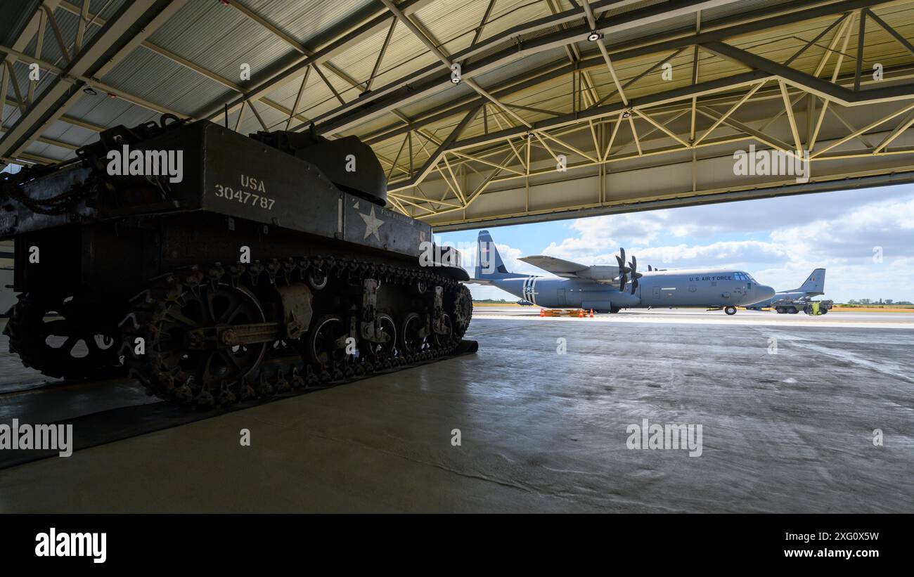 A M3 Stuart tank, from the Mons Memorial Museum, and a U.S. Air Force C ...
