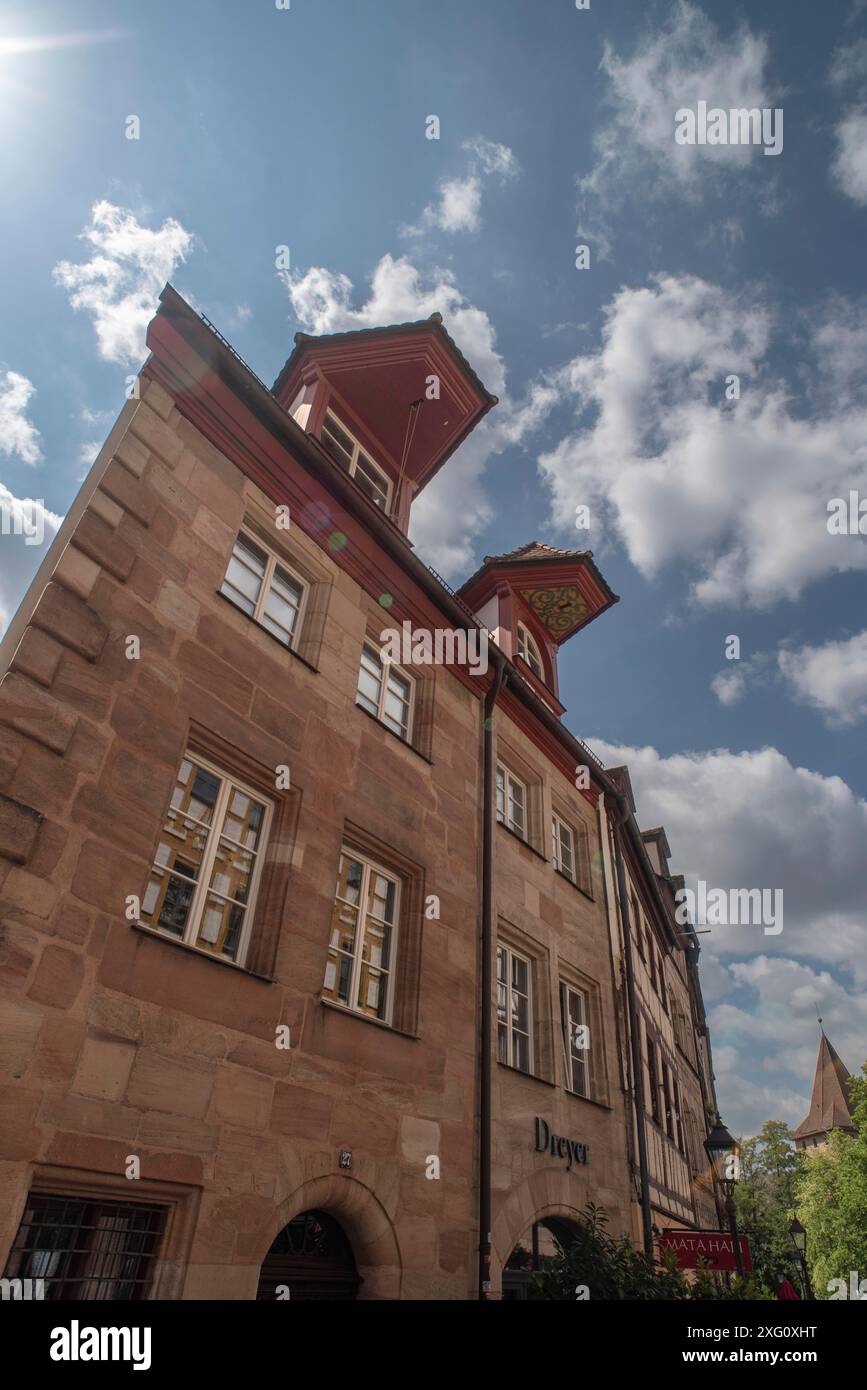 Historic residential buildings with roof lift bay windows ...