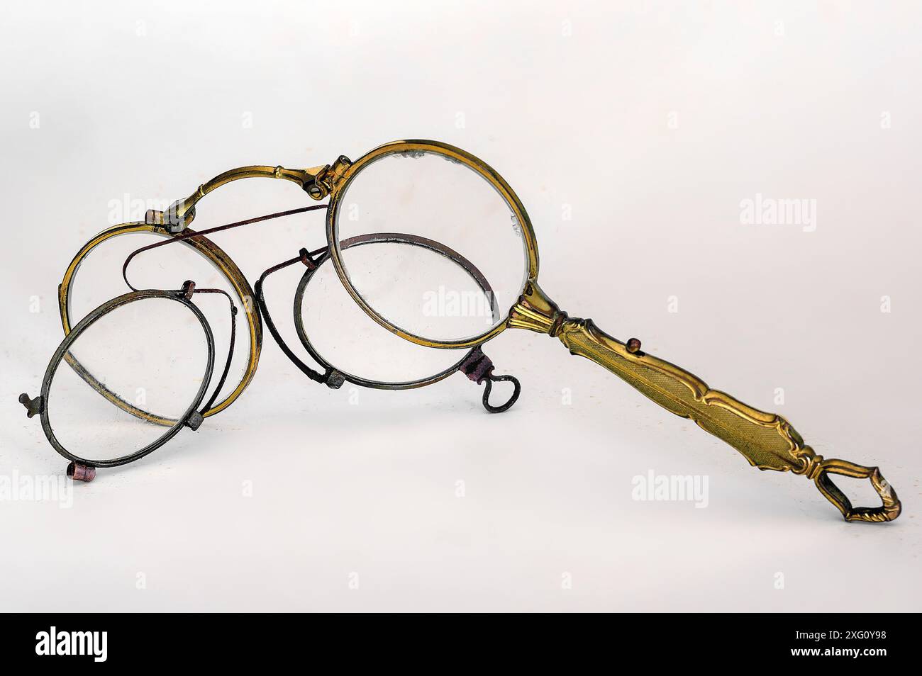 Visual aids, antique lorgnon or lorgnette and pince-nez Stock Photo - Alamy