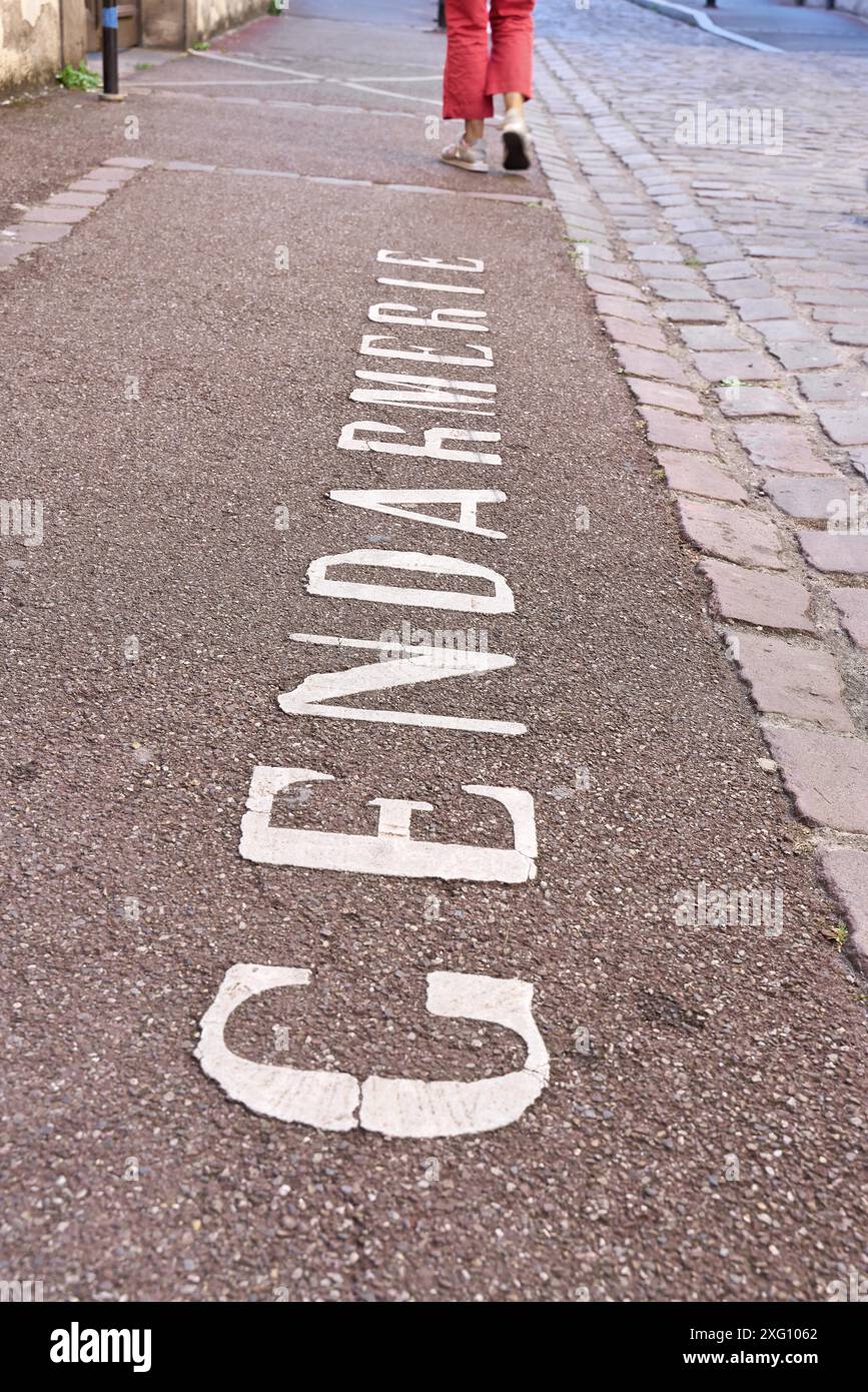 Gendarmerie lettering on a car park in front of a police station in ...