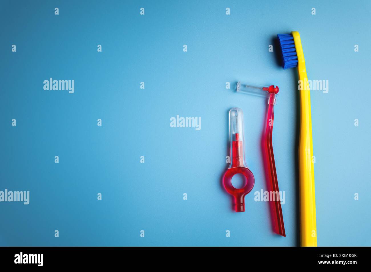 Dental hygiene. Toothbrush, hygienic brushes on a blue background. flat ...