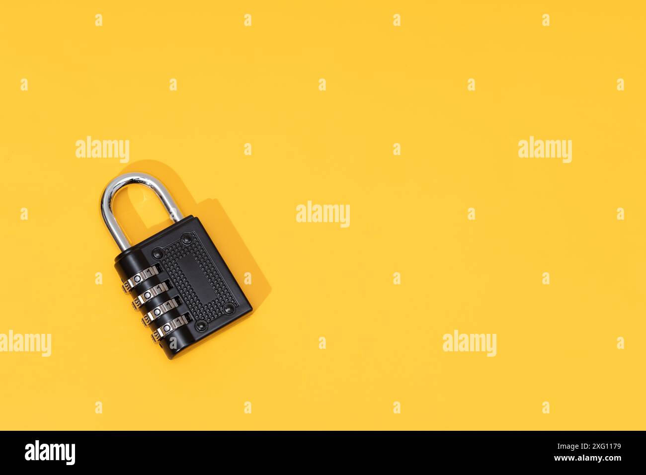 Number Padlock isolated on yellow background. Copy space. Top view ...