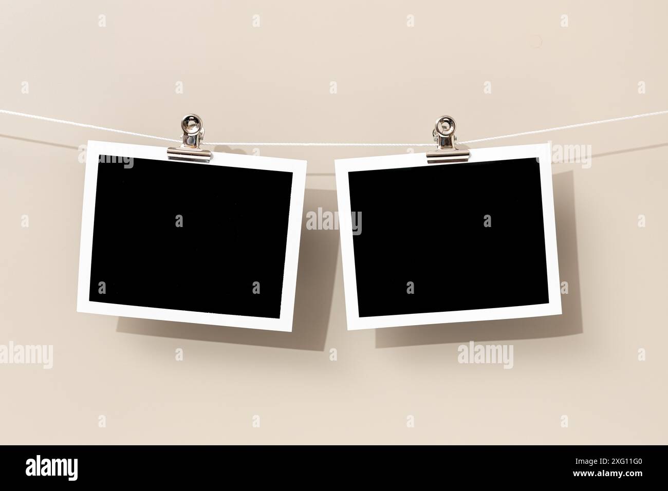 Two Blank Vintage instant photo frame hanging on a rope. Template Stock ...