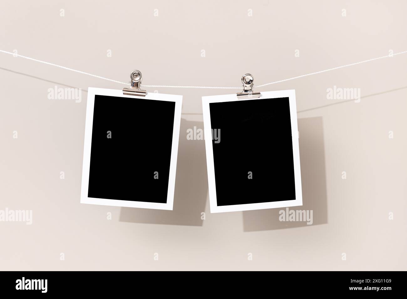 Two Blank Vintage instant photo frame hanging on a rope. Template Stock ...