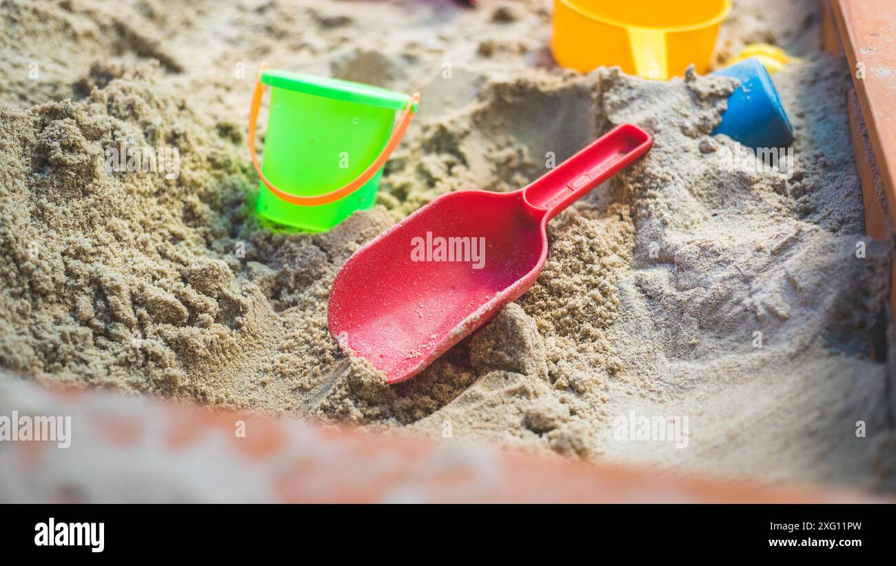 Children toys in sand box hi-res stock photography and images - Alamy