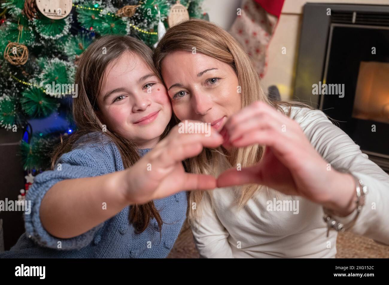 Loving family spends winter holidays at home. Portrait of happy smiling ...