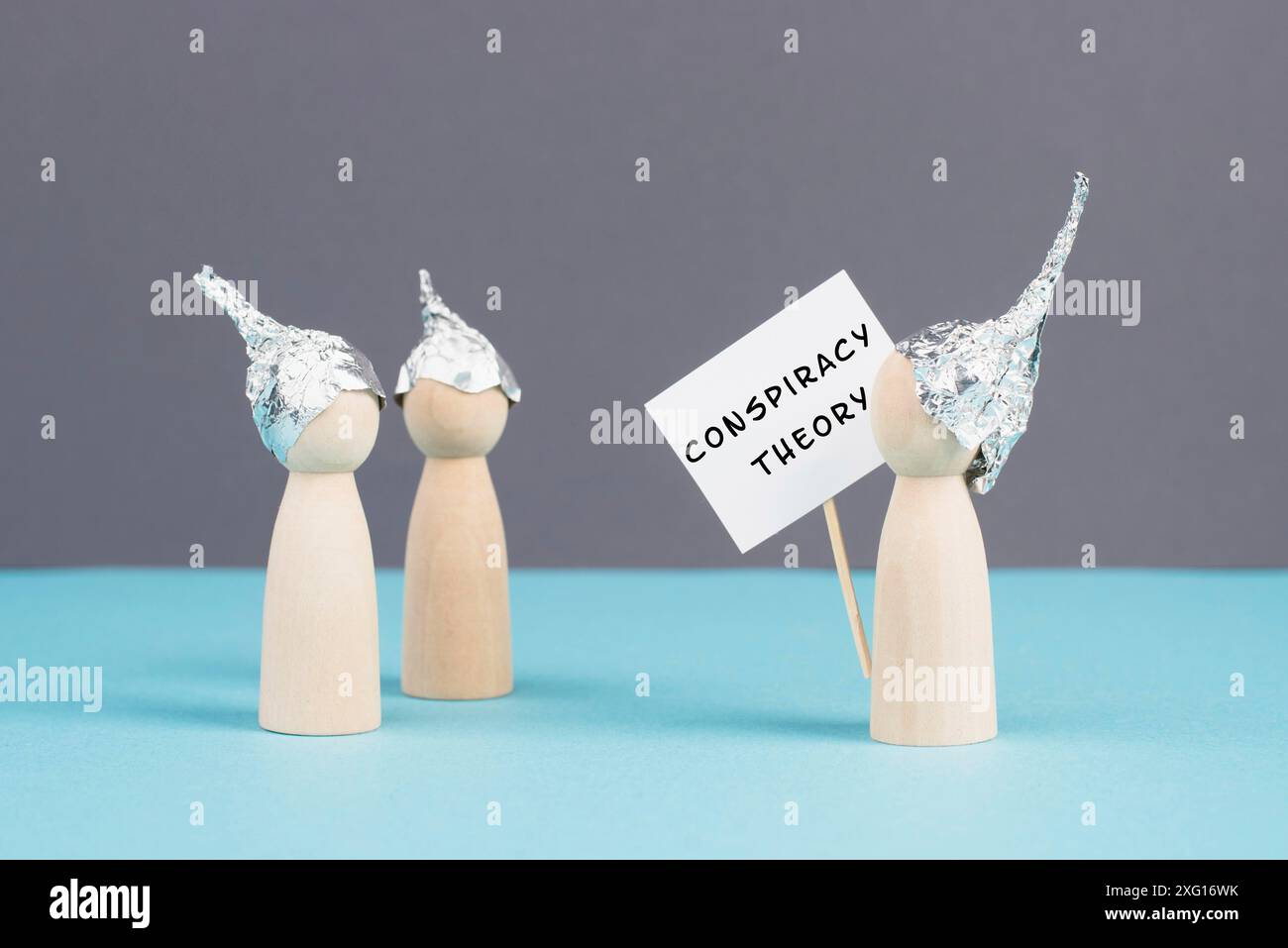 Group with alu hats protesters talking together, conspiracy theories ...