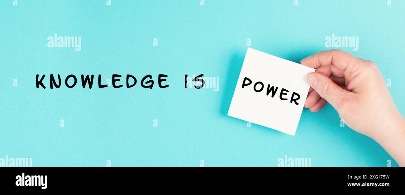 The phrase knowledge is power is standing on a paper, coaching and ...