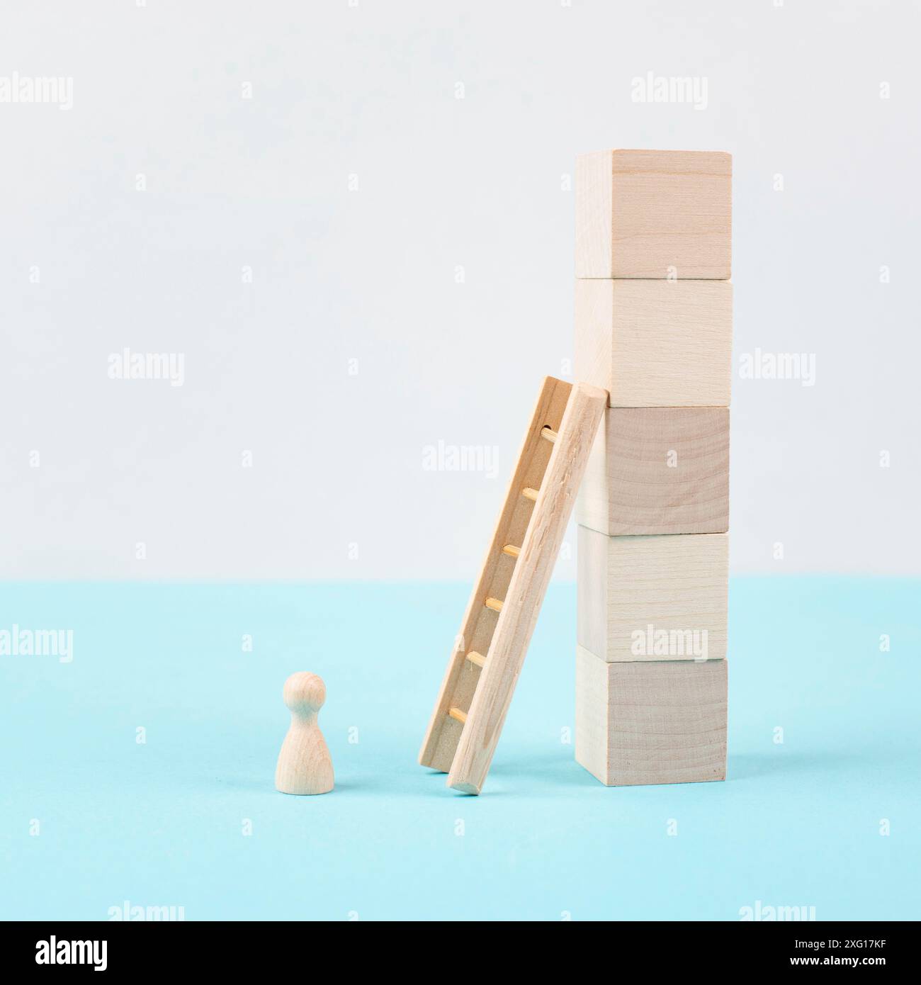 Man is standing next to a ladder, climbing up in career, having a goal ...