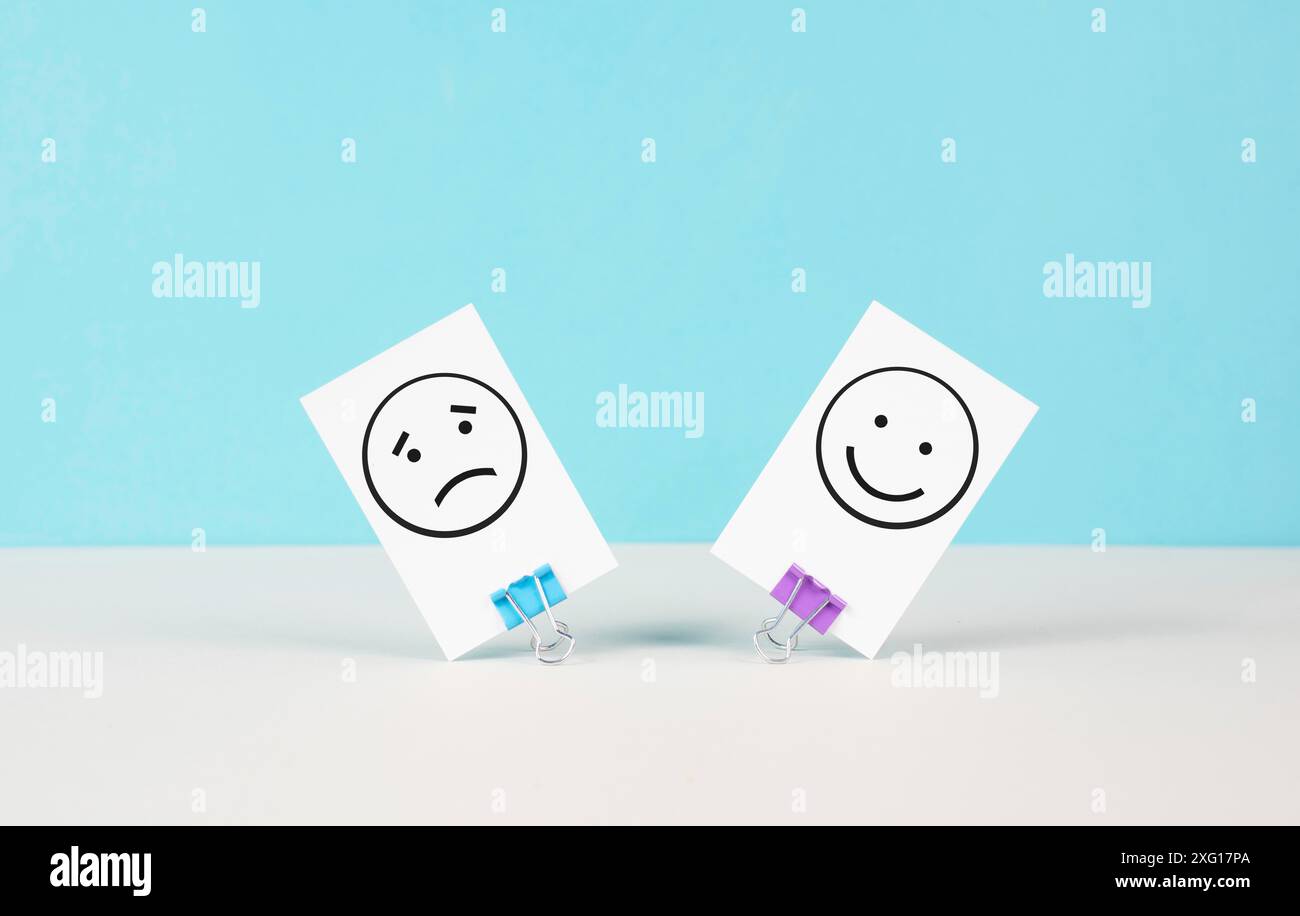 Head with a sad and a happy face, mental health concept, positive and ...
