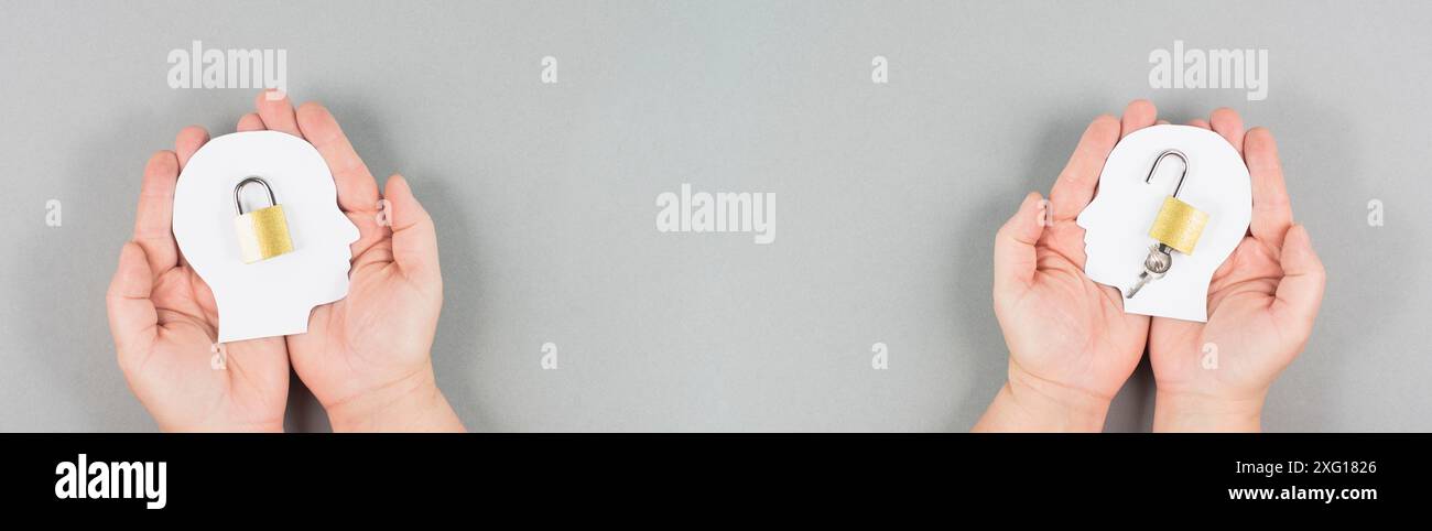 Silhouette of two people, one man is closed minded with a lock in his ...