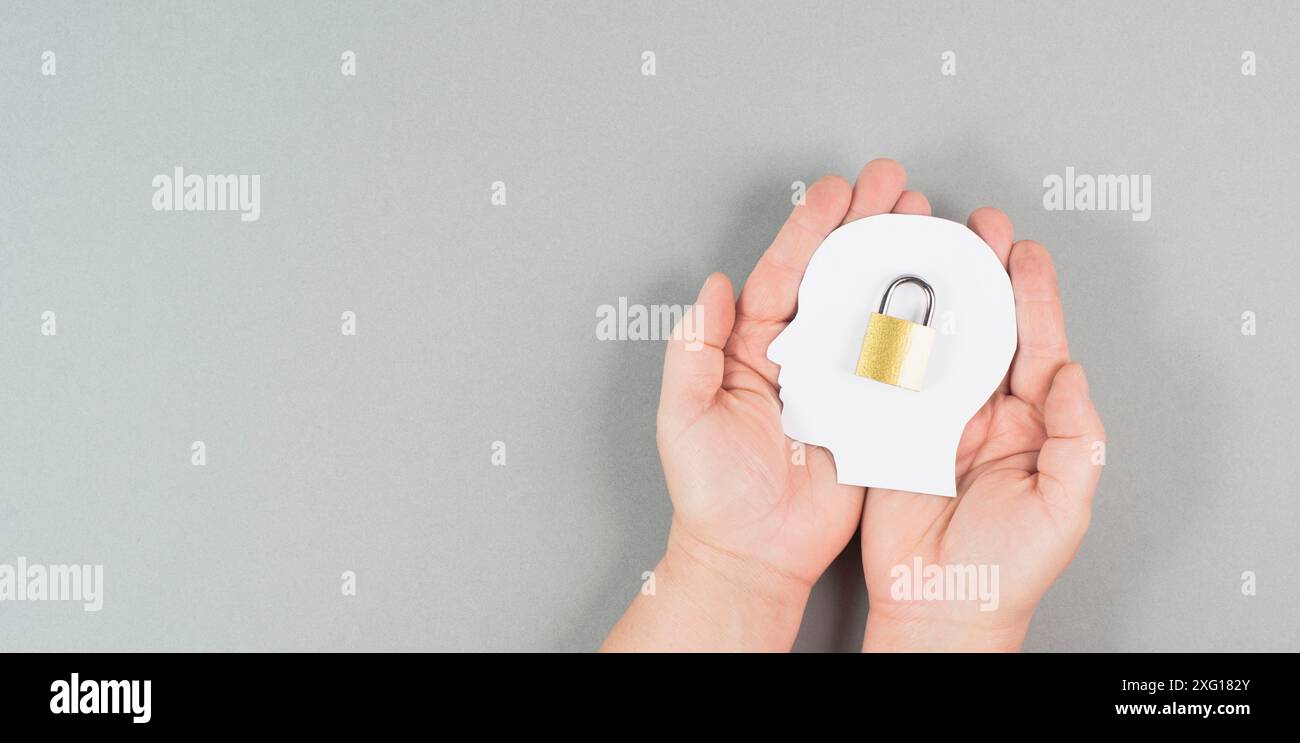Silhouette of a head with a lock, lockout from computer cloud, safety ...
