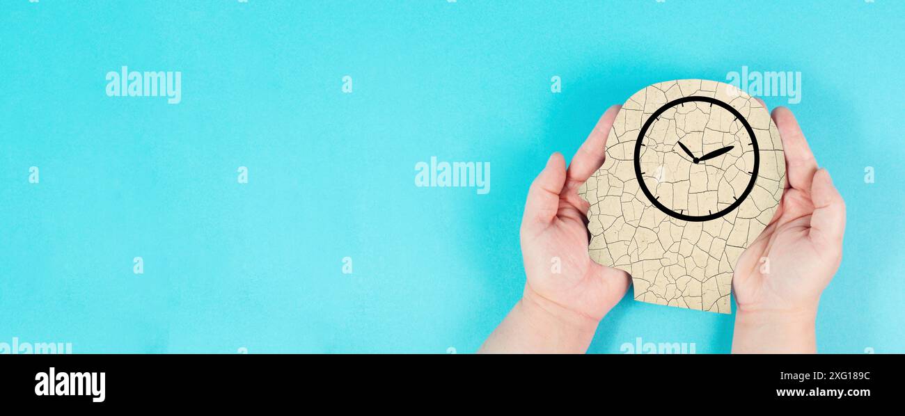 Silhouette of a head with a clock, time pressure and management in ...