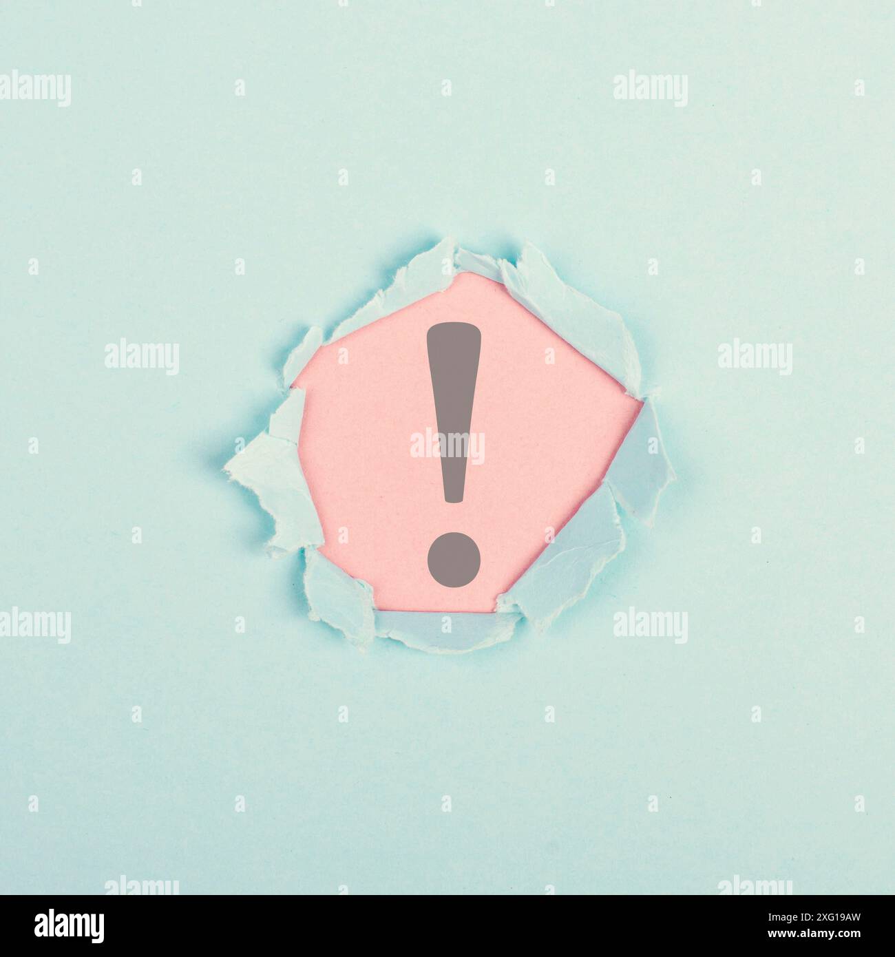 Exclamation mark surrounded by torn paper, alert sign, information and ...