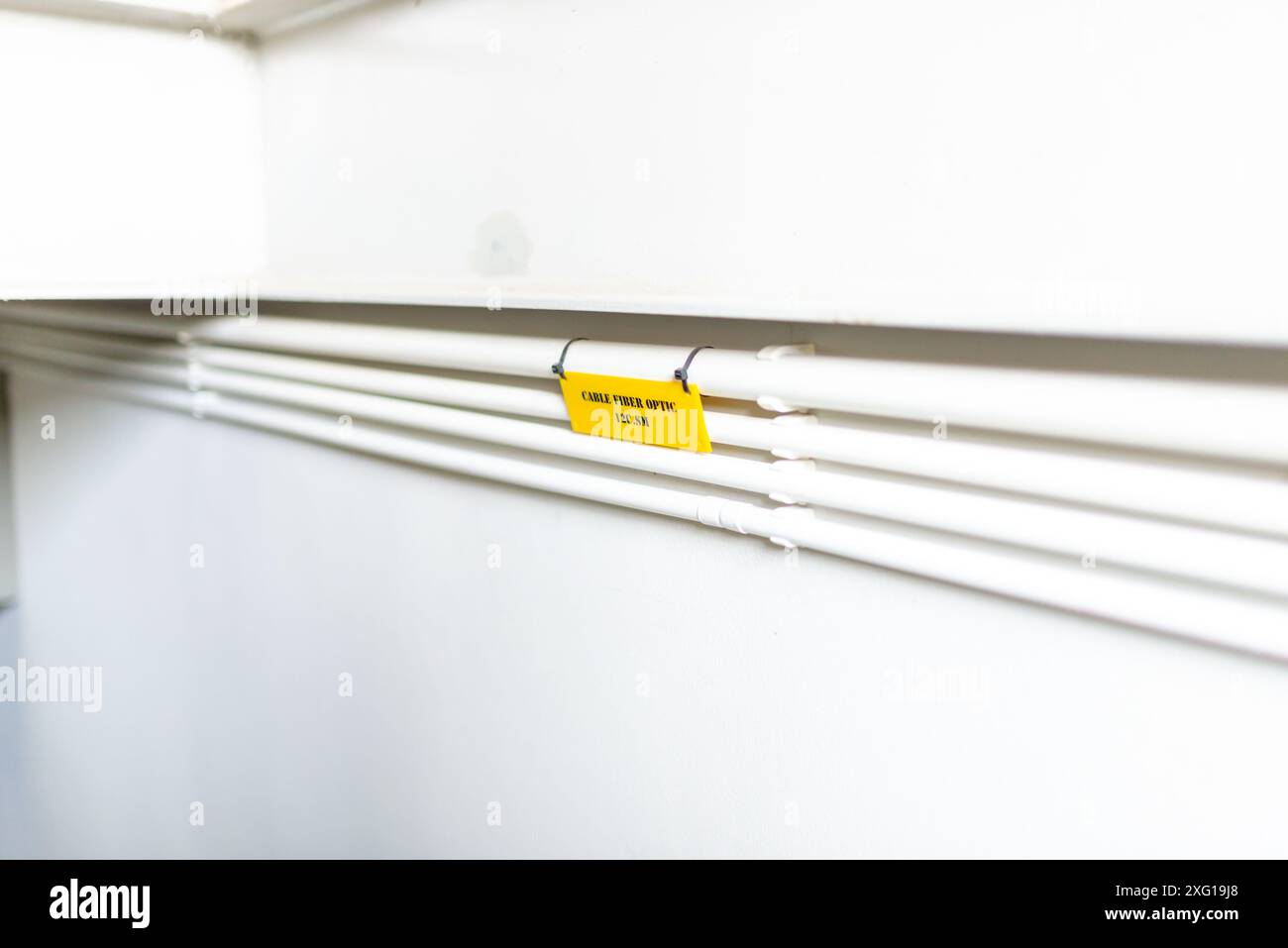 Cables and wires in a white box. Close-up Stock Photo - Alamy