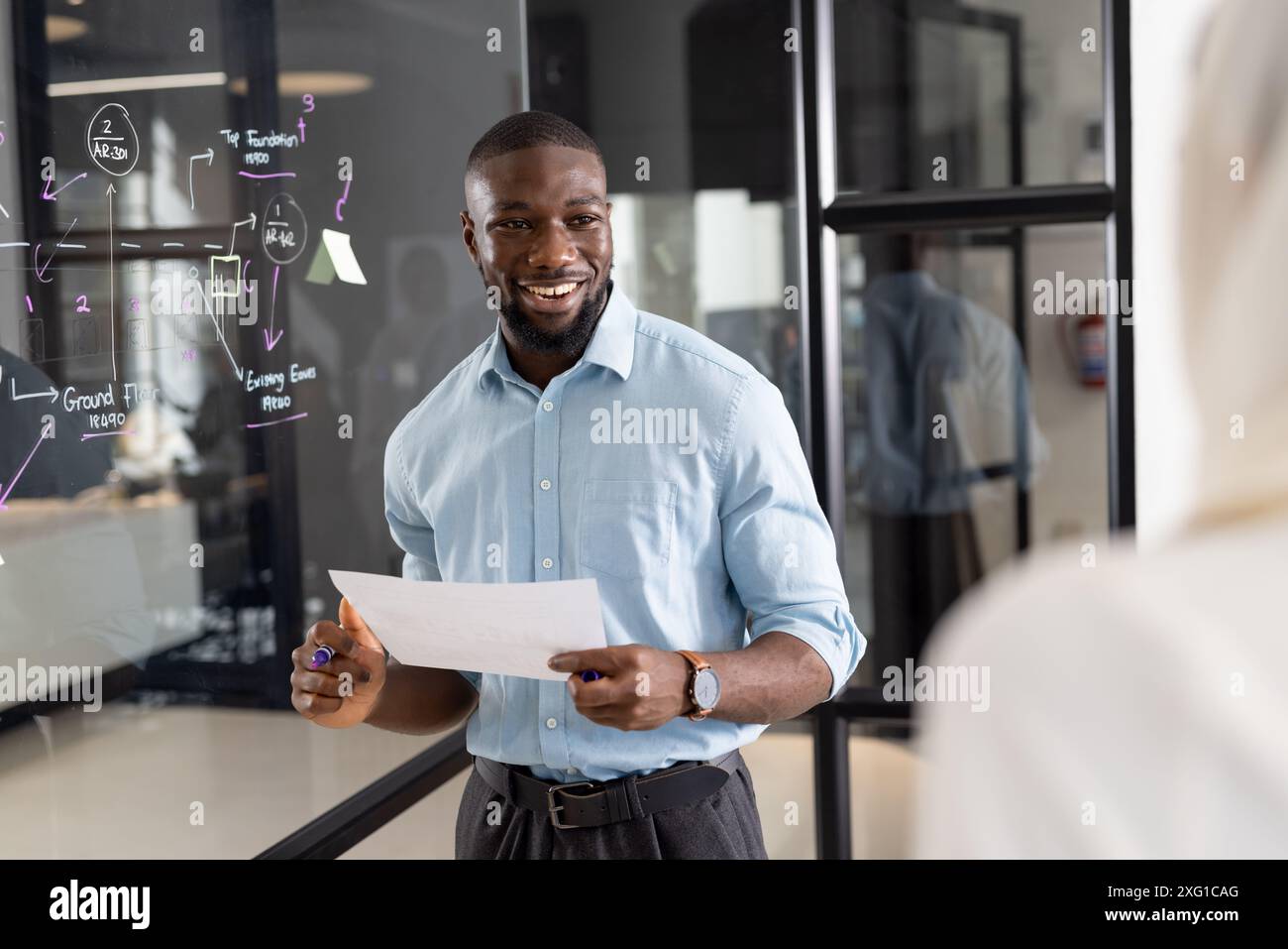 Business man holding charts graphs hi-res stock photography and images ...