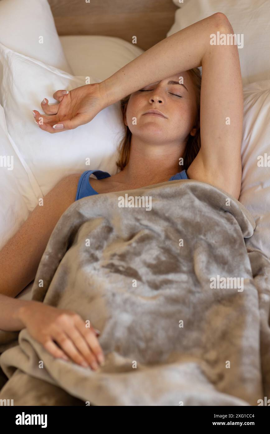 Woman peacefully sleeping in bed hi-res stock photography and images ...