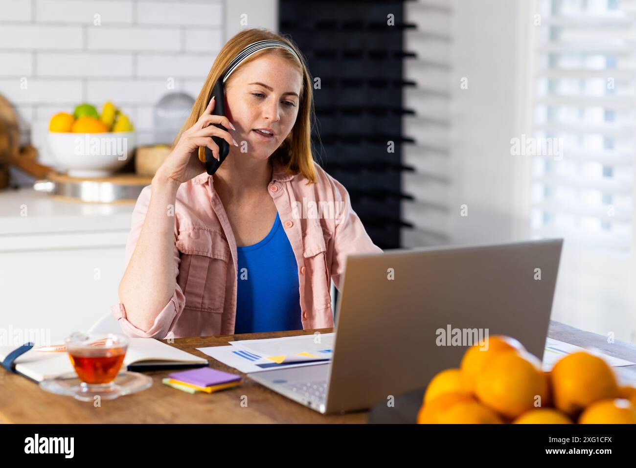 Multitasking business woman hi-res stock photography and images - Alamy