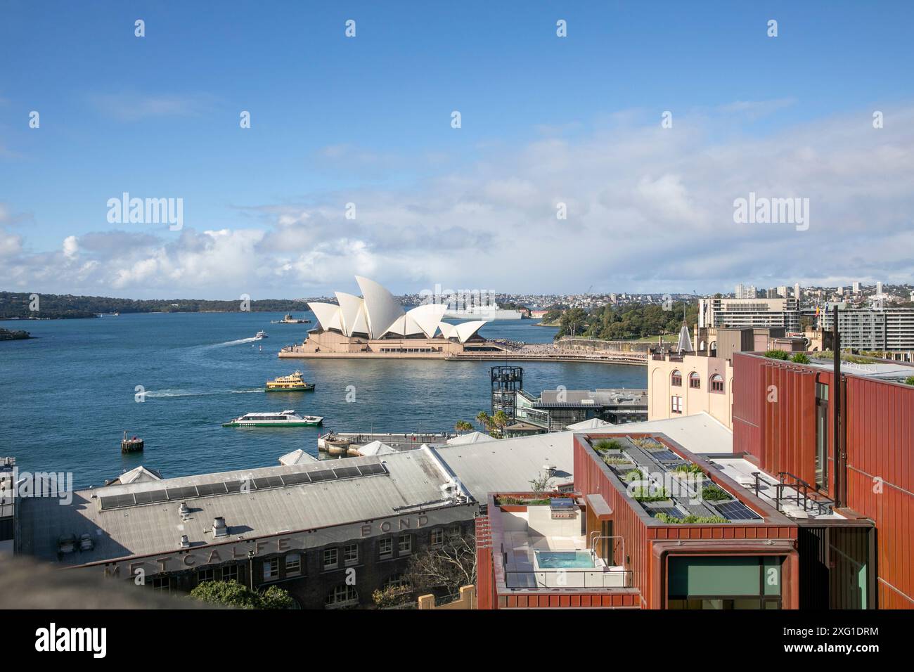 Sydney Opera House and Sydney harbour, rooftops of refurbished Sirius ...