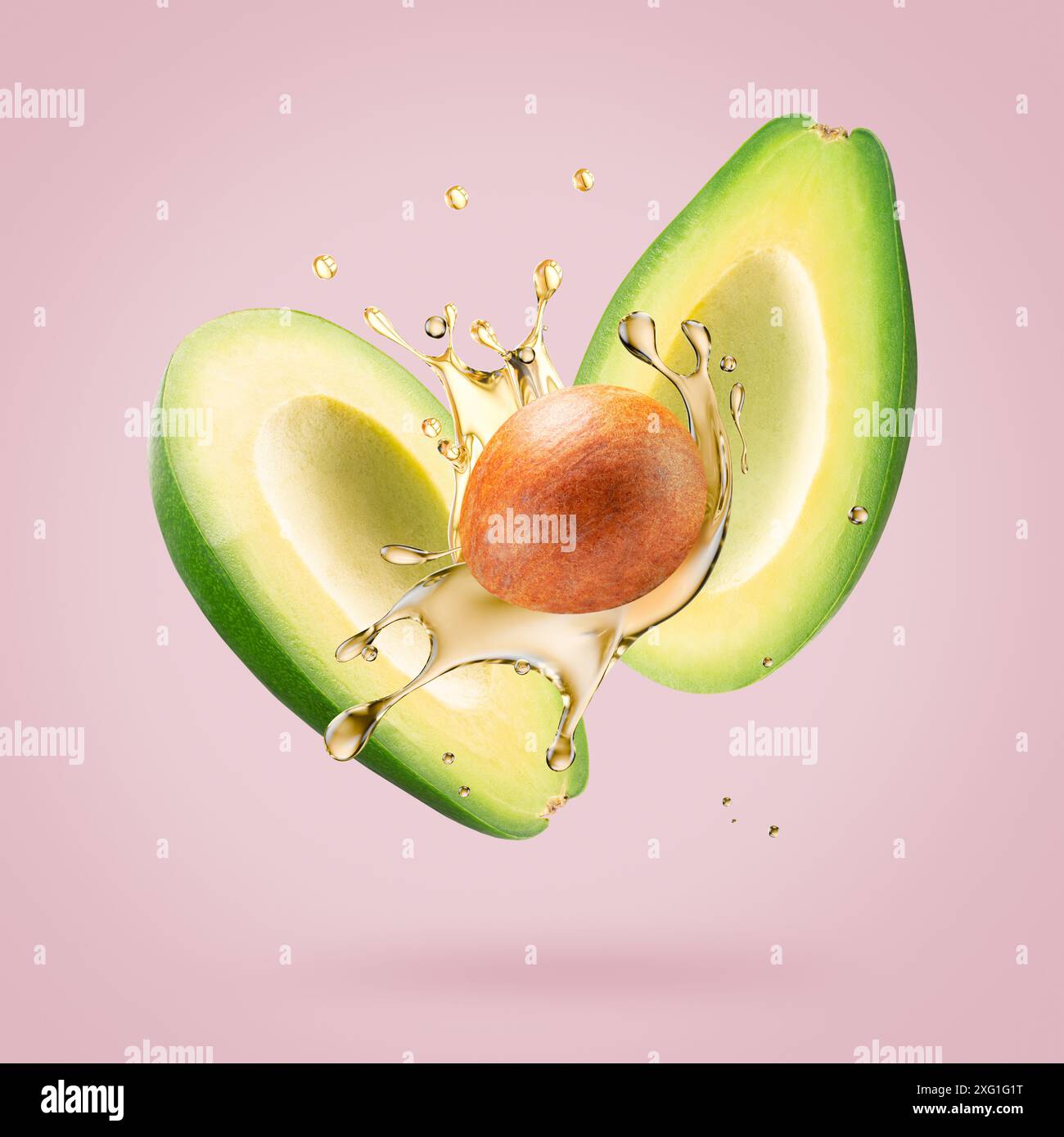 Half avocado oil splash hi-res stock photography and images - Alamy