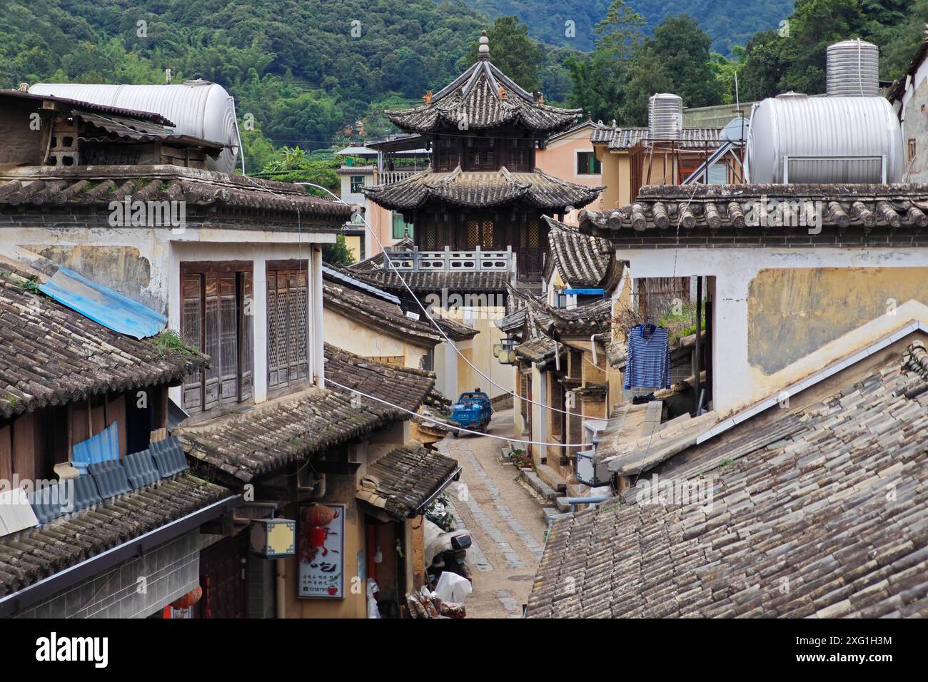 PU'ER, CHINA - JULY 1, 2024 - Tourists visit Bixi Ancient Town in Pu ...