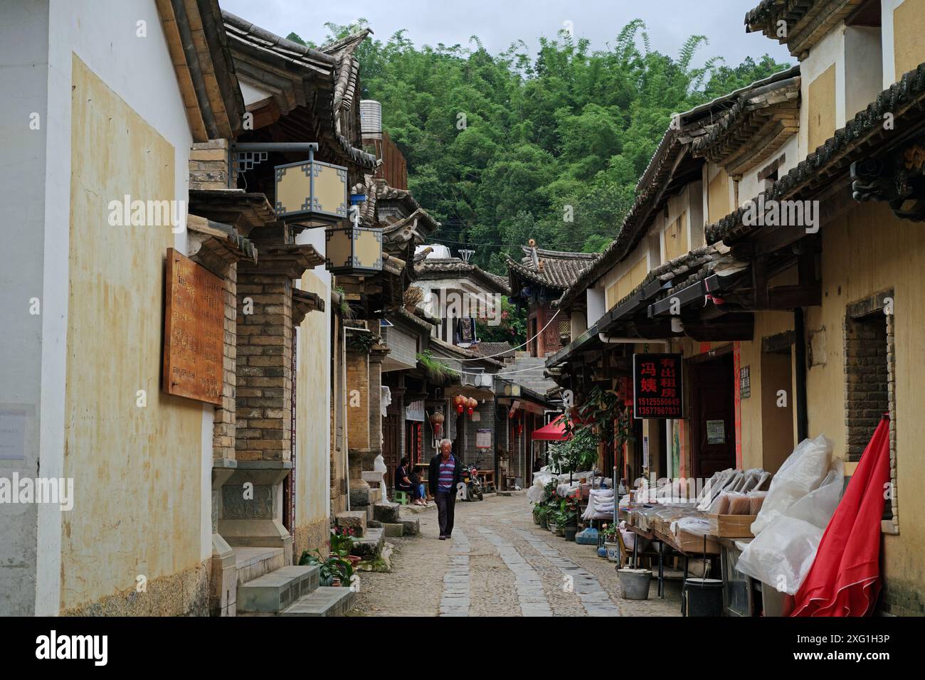 PU'ER, CHINA - JULY 1, 2024 - Tourists visit Bixi Ancient Town in Pu ...