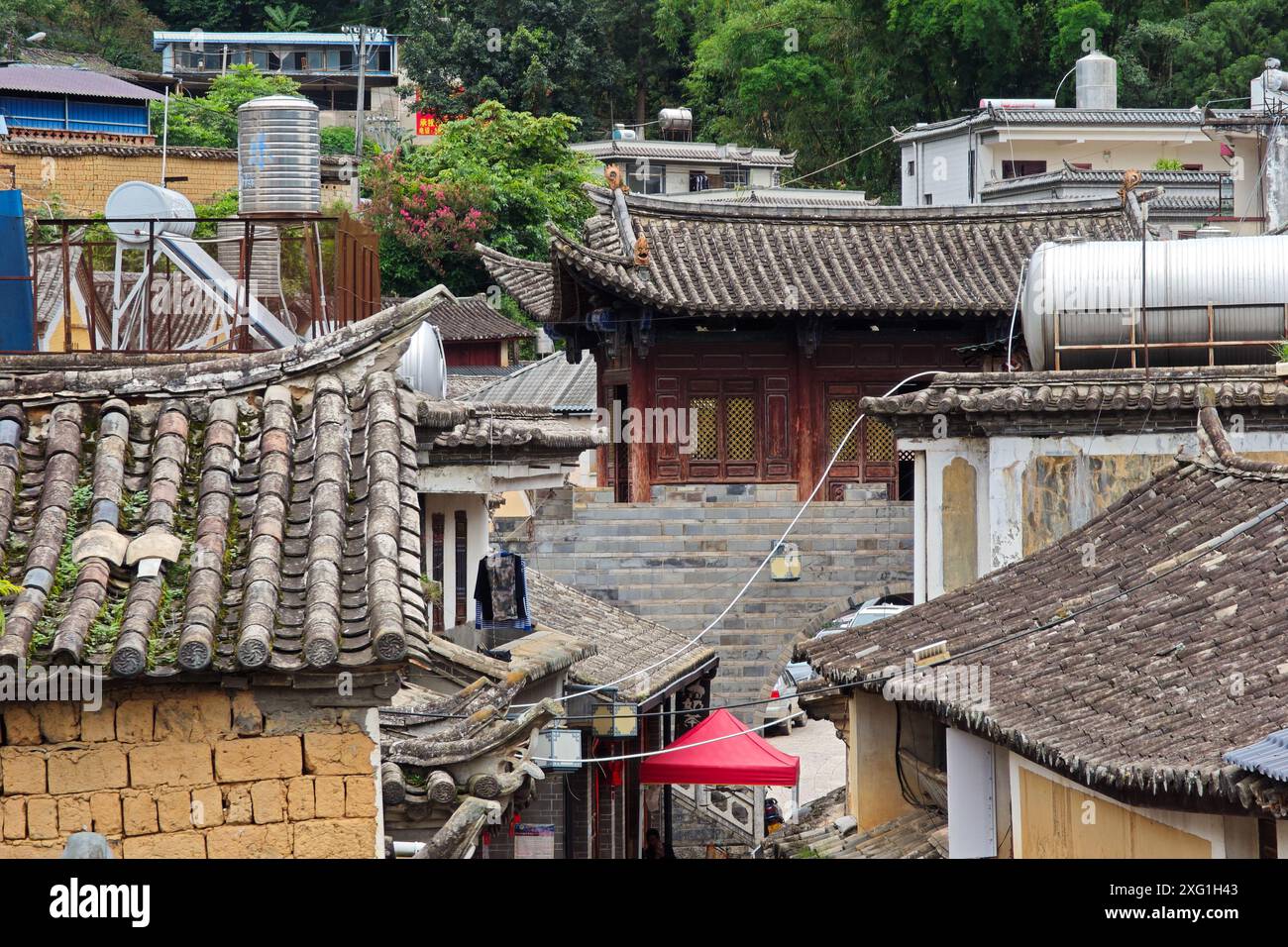 PU'ER, CHINA - JULY 1, 2024 - Tourists visit Bixi Ancient Town in Pu ...